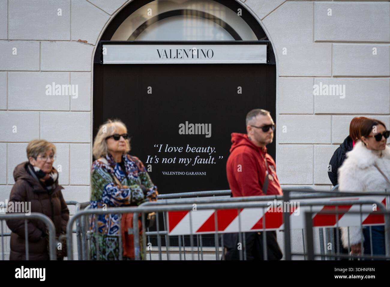 Shop window at Valentino's stores in Piazza Mignanelli are lined with ...