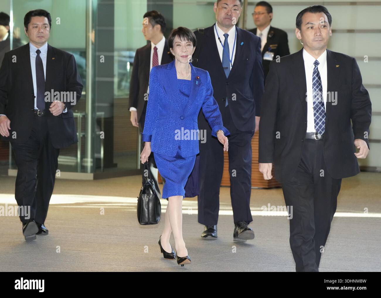 Japanese Prime Minister Sanae Takaichi (C) arrives at the prime ...