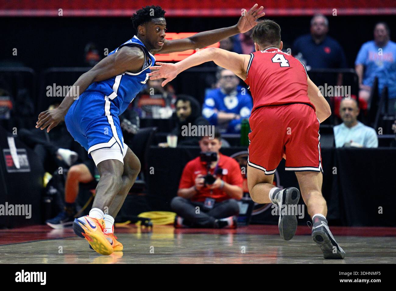 BYU forward AJ Dybantsa, left, defends against Dayton guard Jordan ...