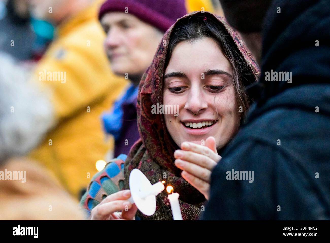 A candlelight vigil is held in Pliny Park in Brattleboro on Thursday ...