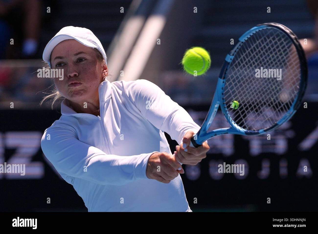 Yulia Putintseva of Kazakhstan plays a backhand return to Zeynep Sonmez ...