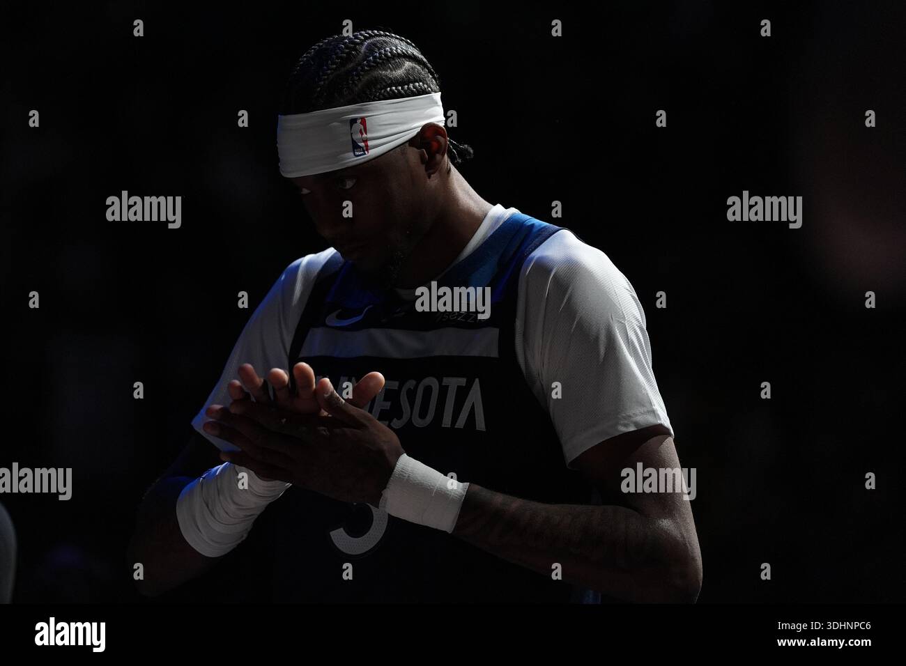 Minnesota Timberwolves forward Jaden McDaniels (3) stands on the court ...