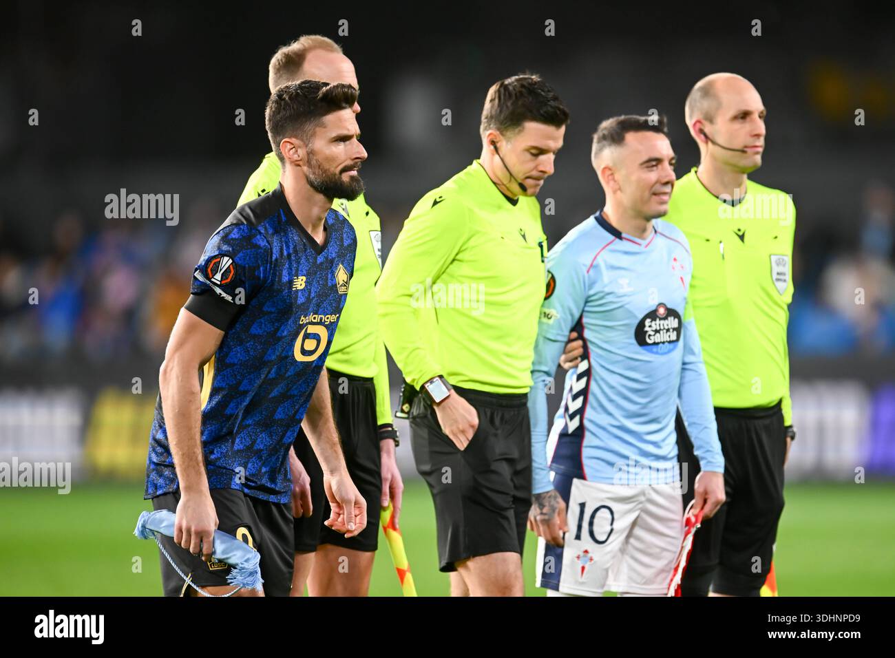 Olivier Giroud of Lille and Ref Harm Osmers and Iago Aspas of Celta ...