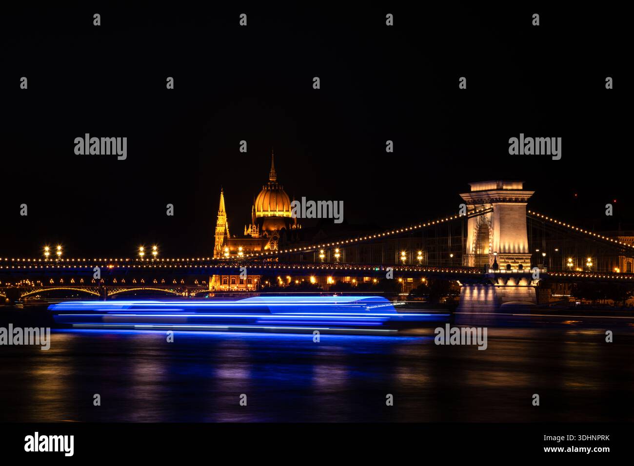 Long Exposure Boat Lights on the Danube River with Chain Bridge and ...