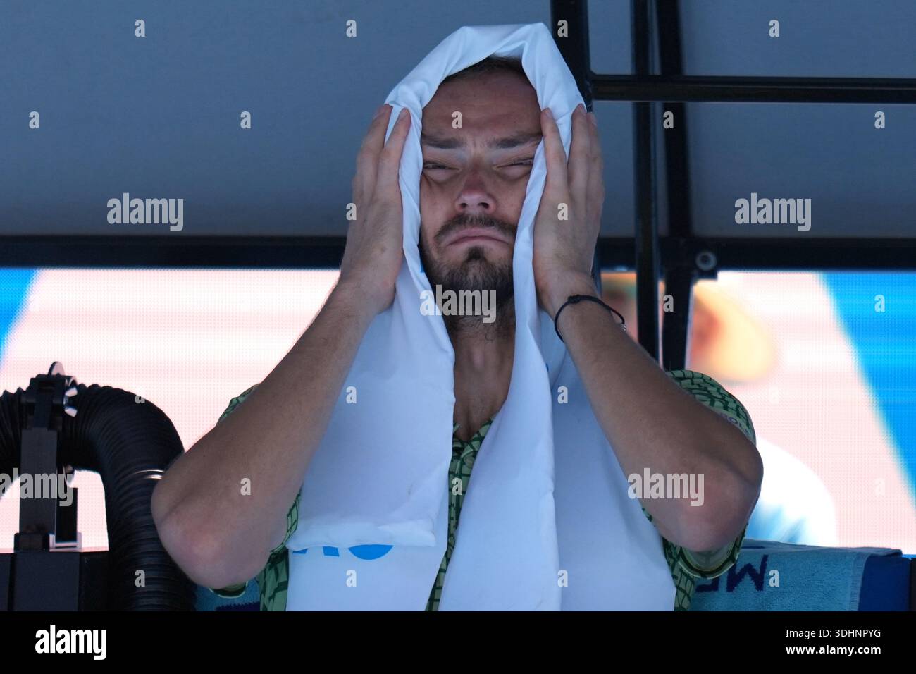 Daniil Medvedev of Russia cools himself down during his third round ...