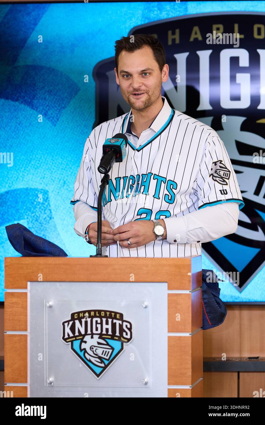 Chad Pinder puts on his jersey as he is introduced as the 2026 ...