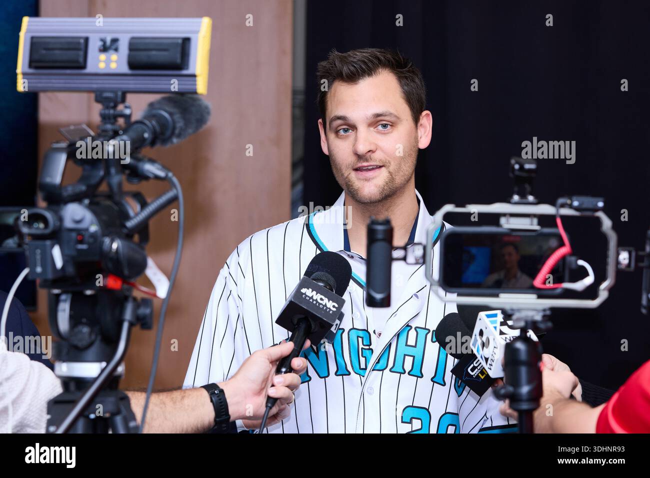 Chad Pinder answers questions from the media as he is introduced as the ...
