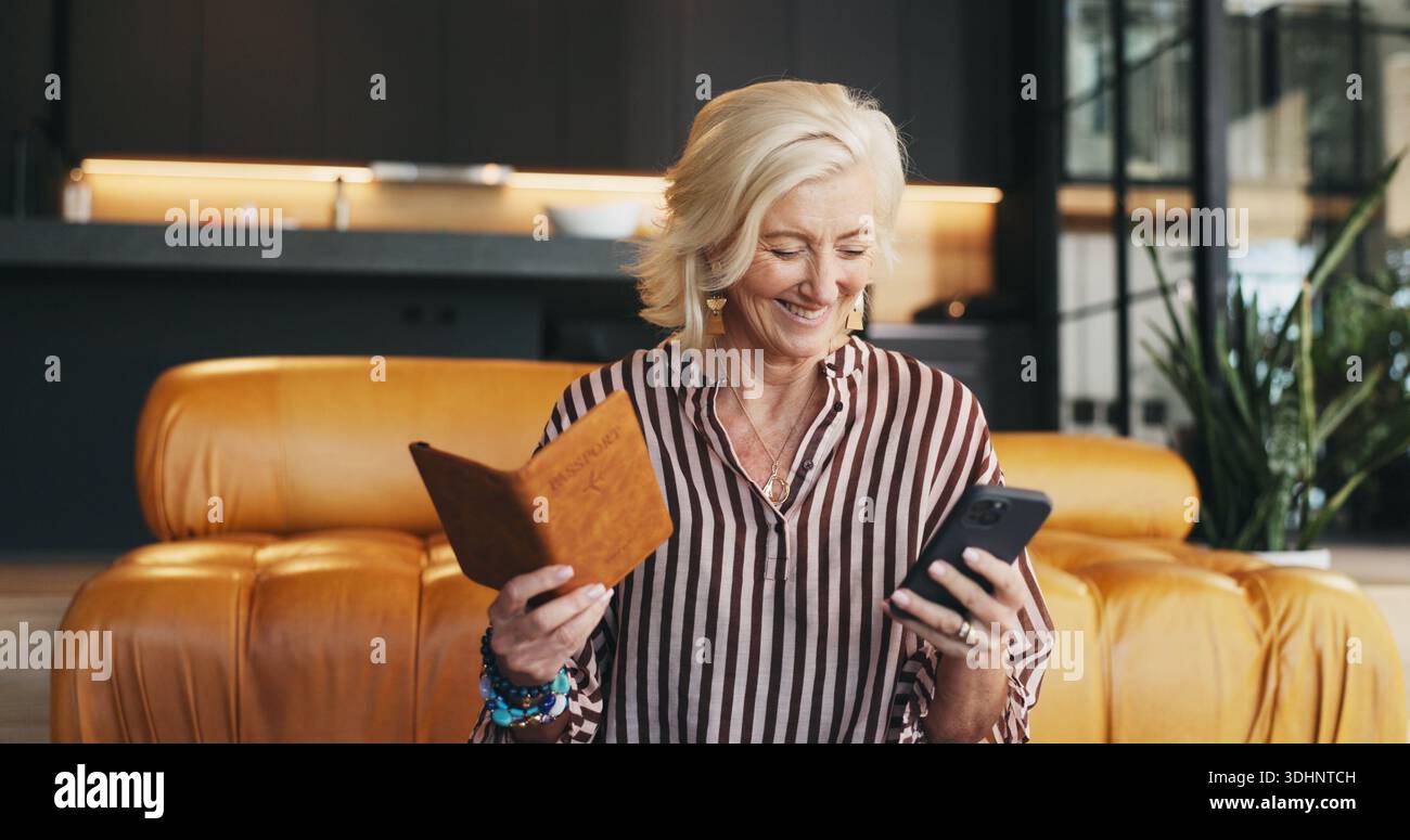 Happy woman passport typing hi-res stock photography and images - Alamy