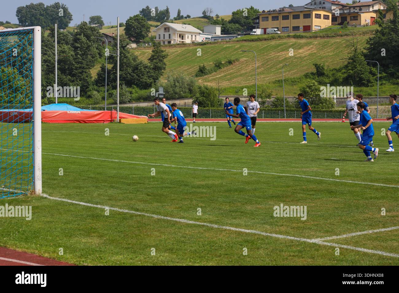 Athletic soccer player executing an impressive acrobatic kick in the ...