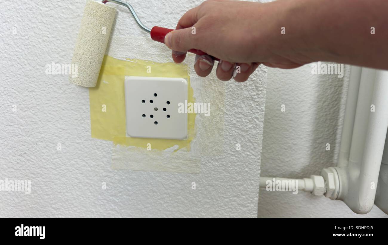 Painting wall around masked hi-res stock photography and images - Alamy