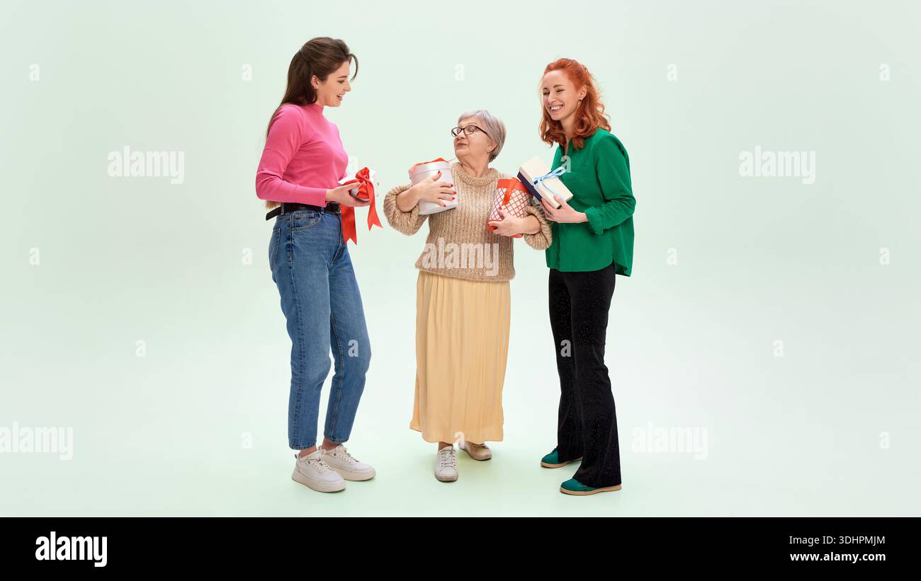 Women of different generations celebrating International Womens Day ...