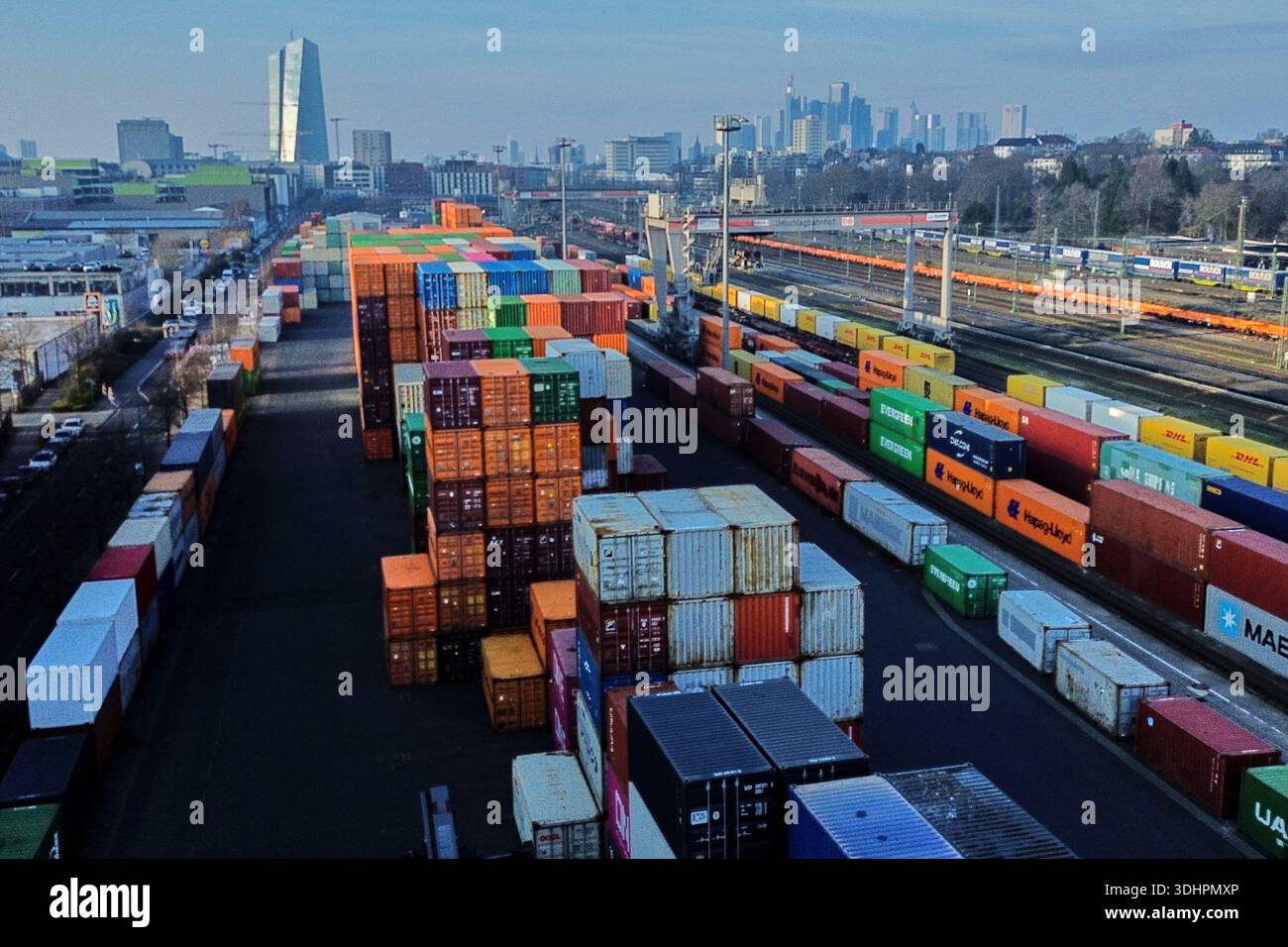 Containers are piled up at a cargo terminal in Frankfurt, Germany ...
