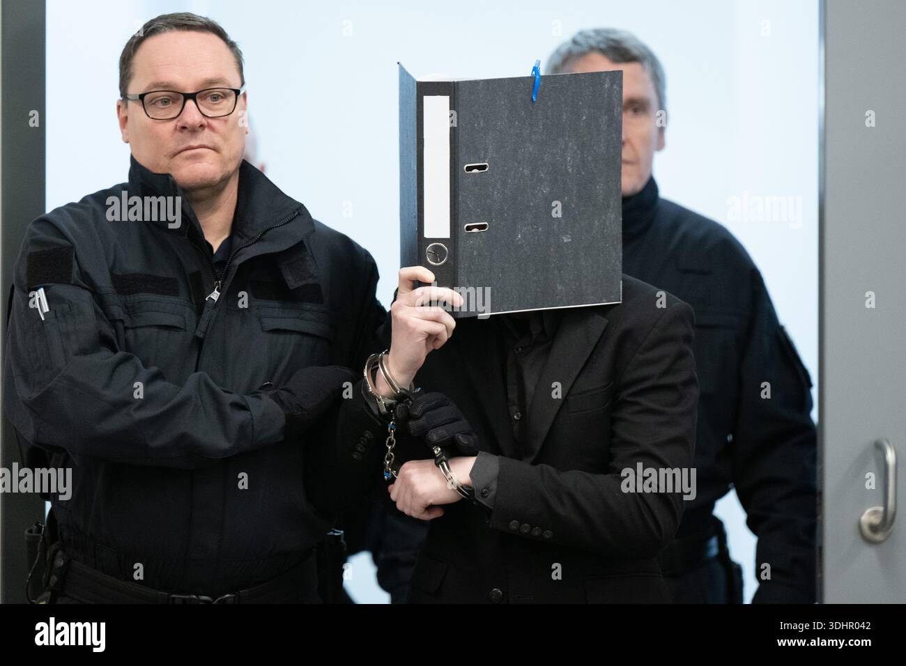 23 January 2026, Saxony, Dresden: One defendant in the trial against a ...