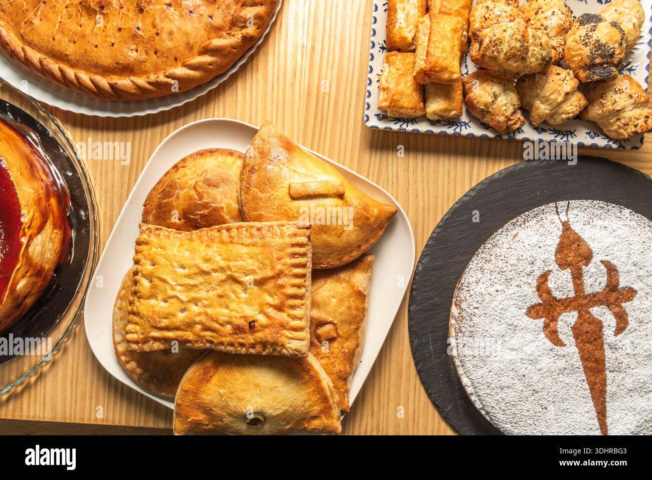 Cod empanadas with raisins and pine nuts, a traditional filling, cut ...