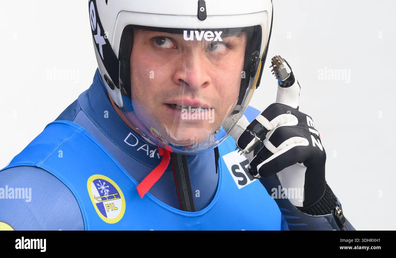 Austria's Jonas Müller crosses the finish line on second place during ...