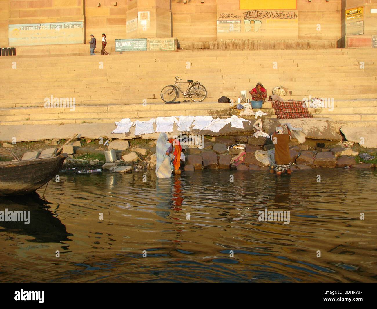 People washing clothes along the Ganges River in Varanasi, India Stock ...