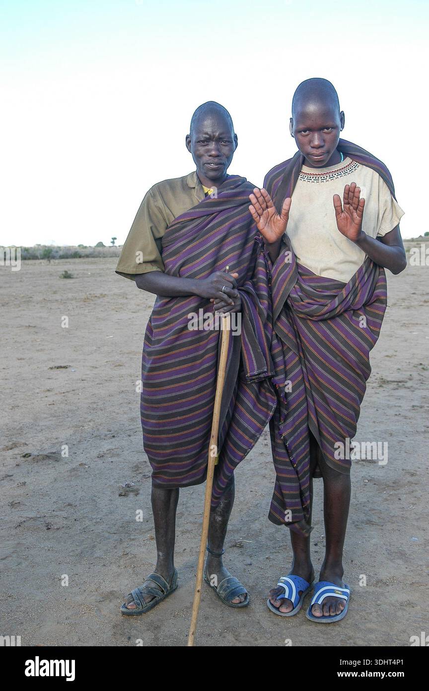 Karimojong young men pose for a photo in Kotido, Karamoja, Uganda ...