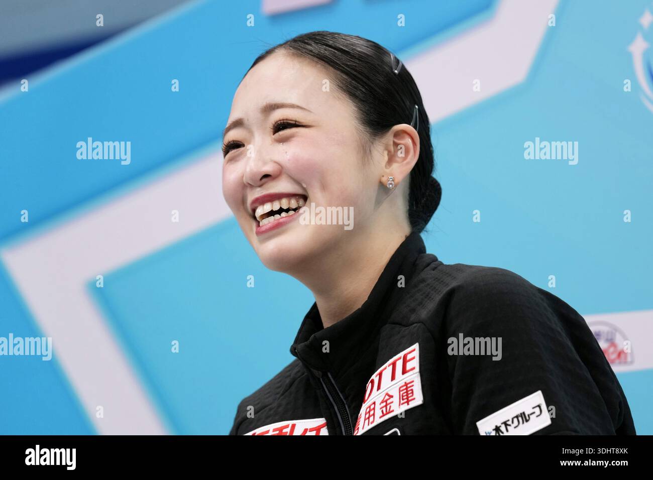 Yuna Aoki of Japan sheds a tear after winning the women's category gold ...