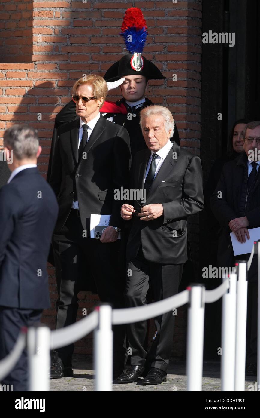 Bruce Hoeksema, left, and Giancarlo Giammetti leave after attending the ...