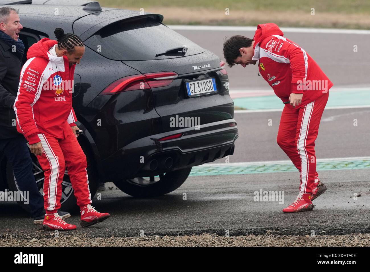 Ferrari drivers Lewis Hamilton, left, of Britain, and Charles Leclerc ...