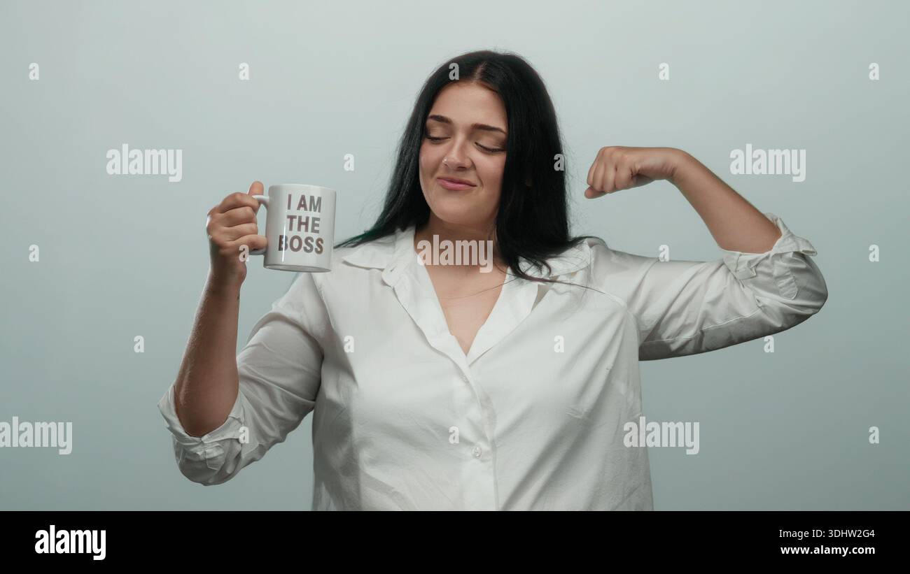Woman flexing mug labeled hi-res stock photography and images - Alamy