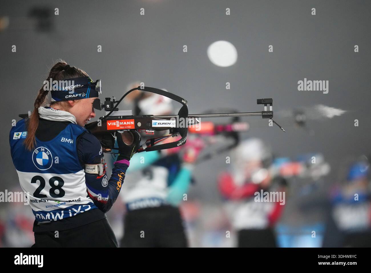 Jeanne Richard, of France, shoots during warmup before the women's 12.5 ...
