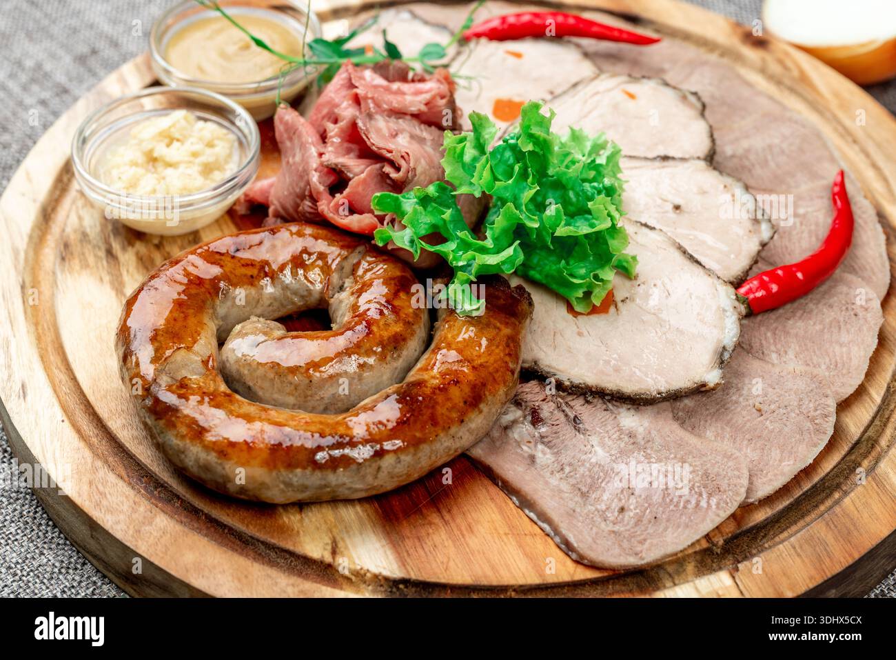 Authentic Russian charcuterie board with sliced boiled beef tongue ...