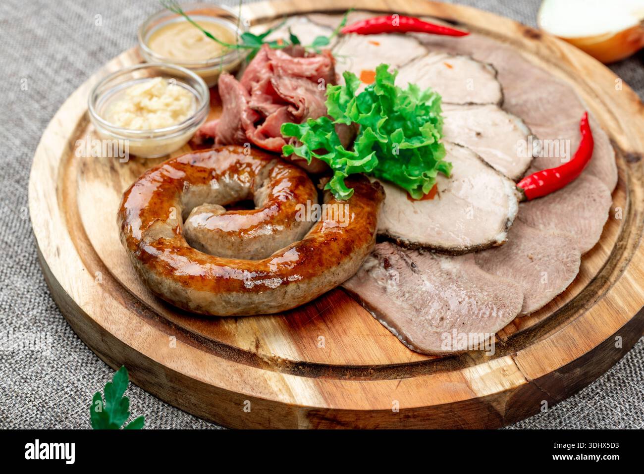 Authentic Russian charcuterie board with sliced boiled beef tongue ...