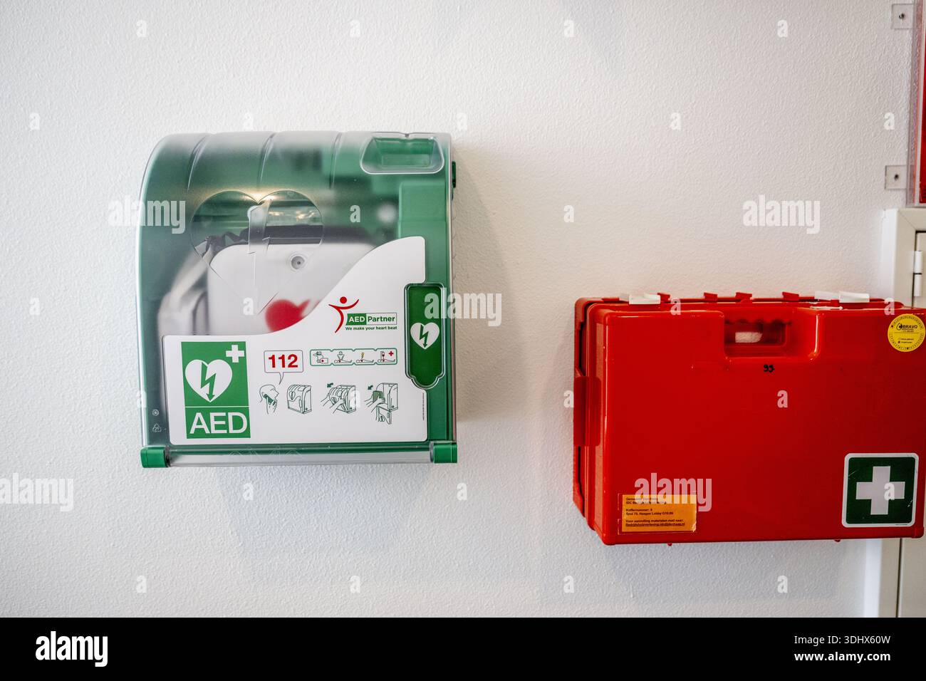 THE HAGUE - An AED on the wall. An automated external defibrillator ...