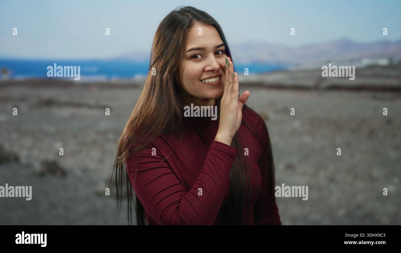 Woman gesturing secret seaside hi-res stock photography and images - Alamy