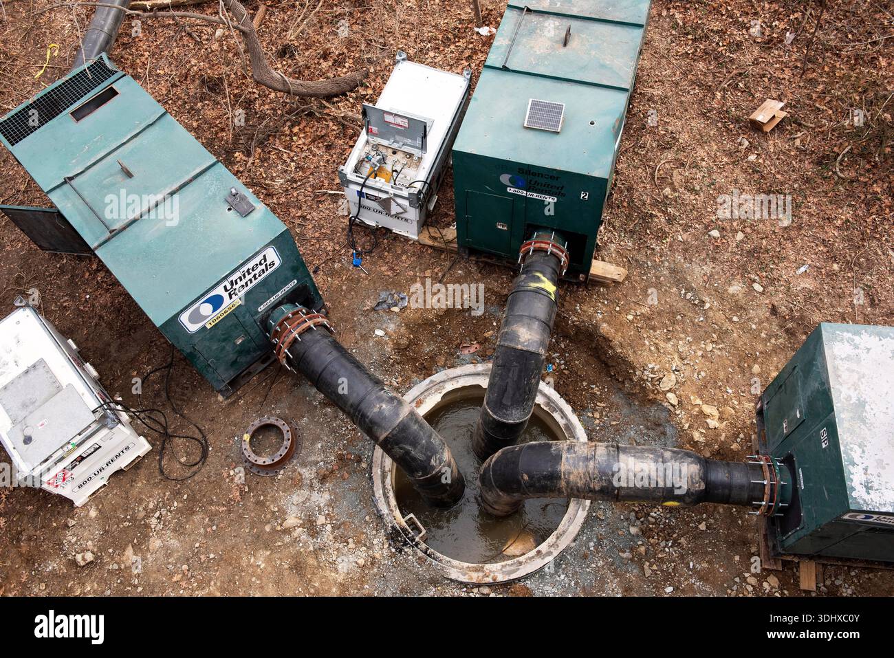 Interceptor pipes inserted into raw sewage after a massive pipe rupture ...