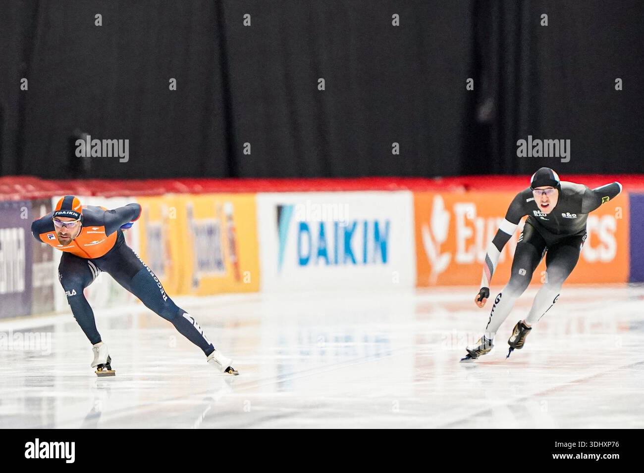 INZELL, GERMANY - JANUARY 23: Kjeld Nuis of Netherlands, Finn Sonnekalb ...