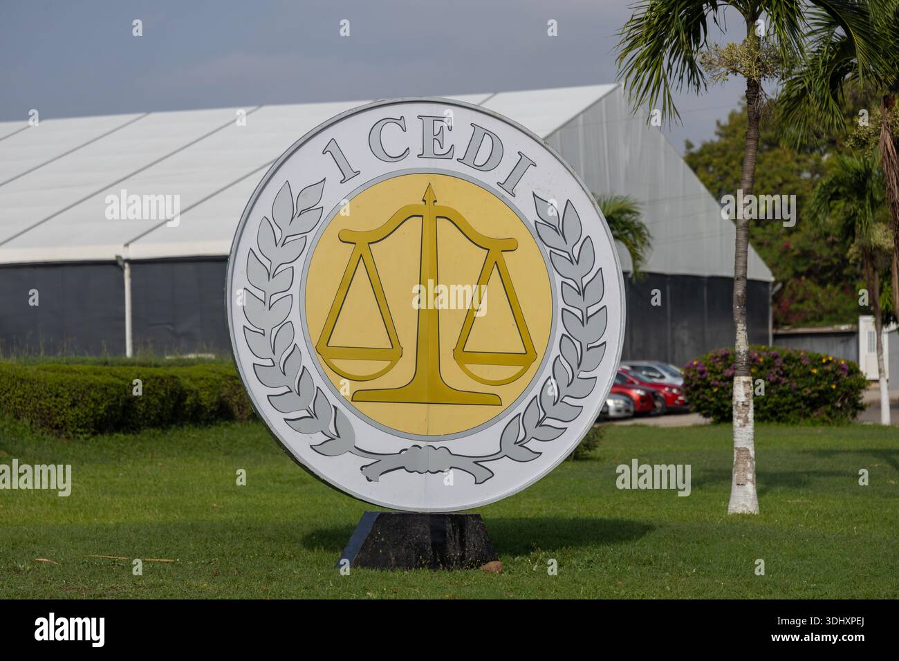 A sign for Ghana's currency, called Cedis, is seen in Accra, Ghana on ...