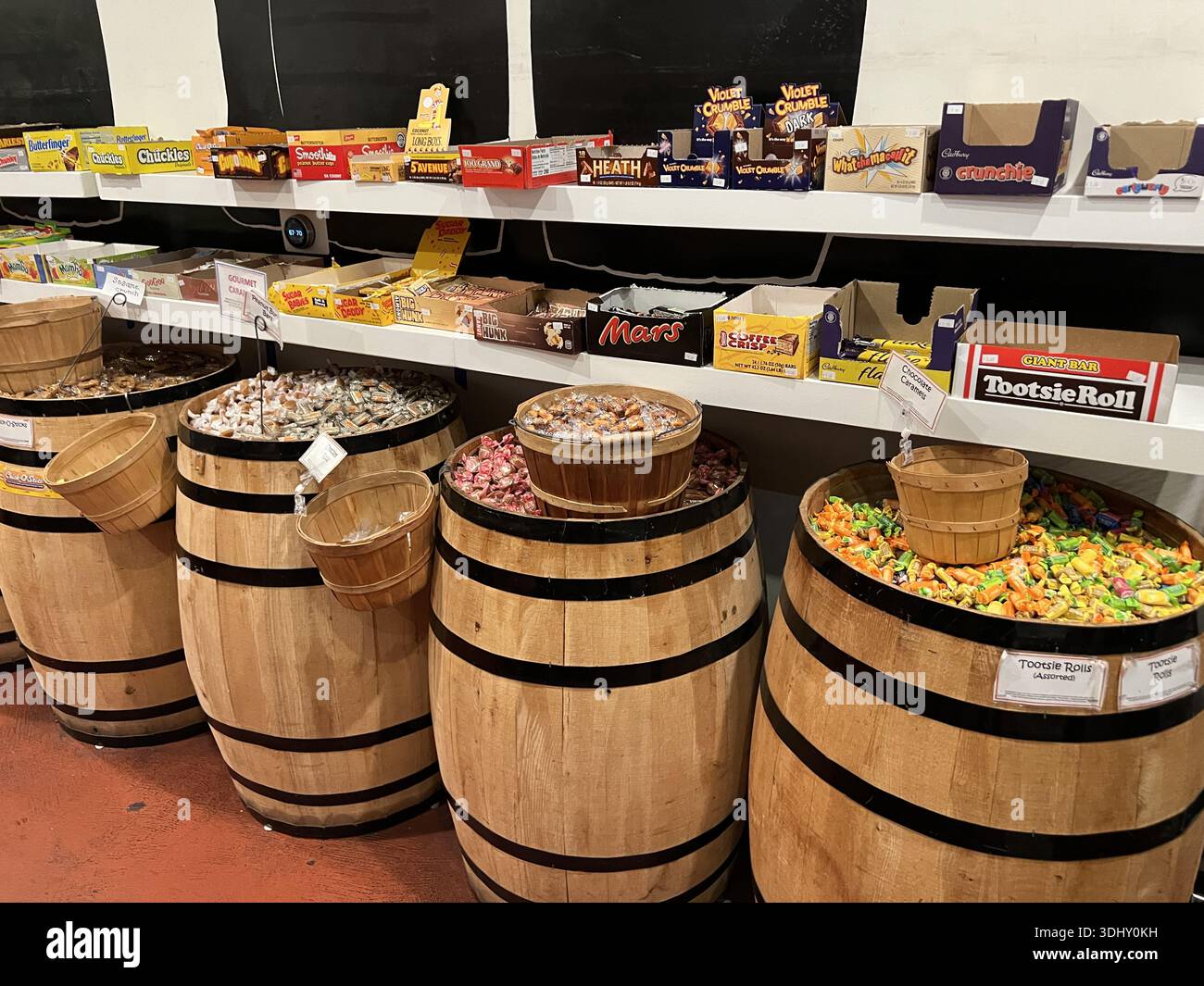 Barrels of candy are visible in a candy store in Newport Beach ...