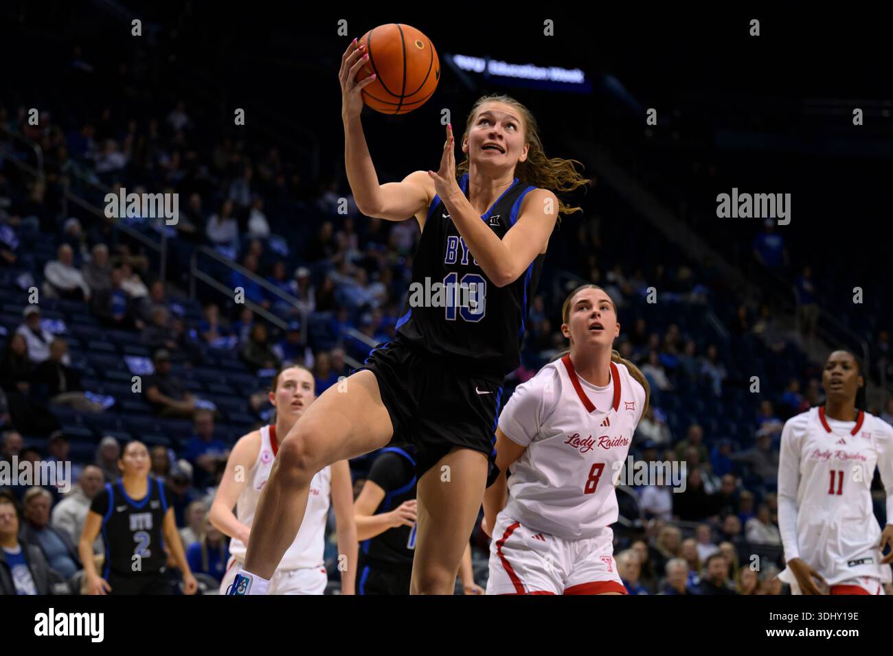 BYU center Lara Rohkohl (13) drives to the basket during an NCAA ...