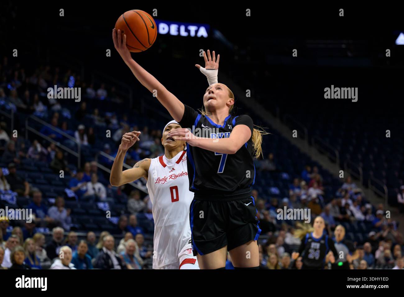 BYU guard Olivia Hamlin (7) shoots guarded Texas Tech guard Snudda ...
