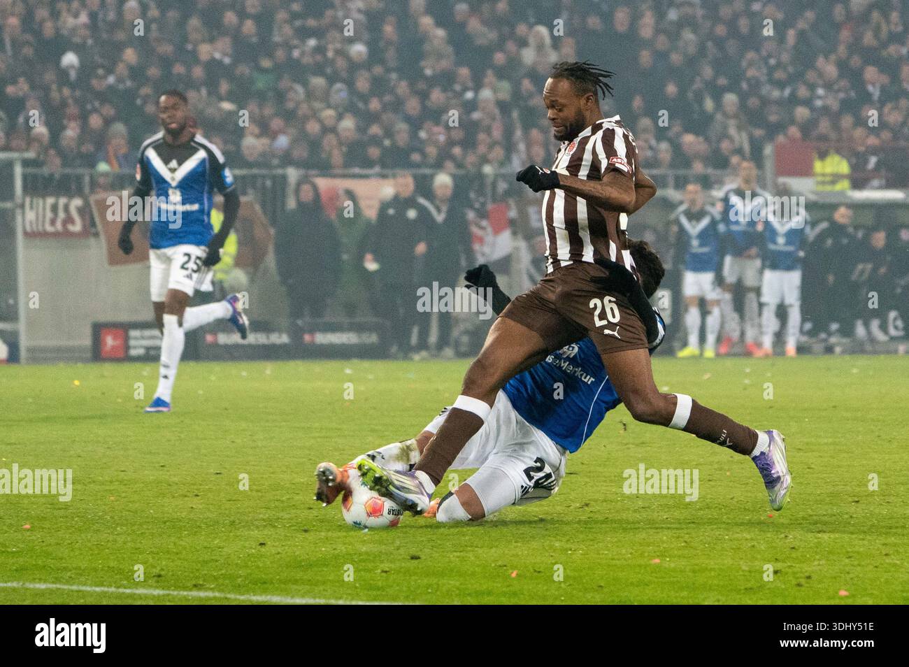 Nicolas Capaldo (HSV Hamburg, #24) tackles Ricky-Jade Jones (FC St ...