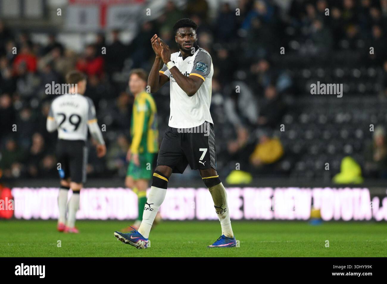 Patrick Agyemang of Derby County applauds his teams supporters after ...