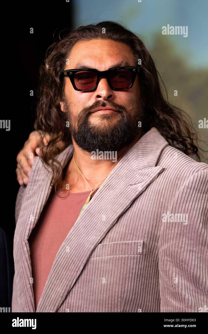 Jason Momoa poses for photographers upon arrival at the screening for ...
