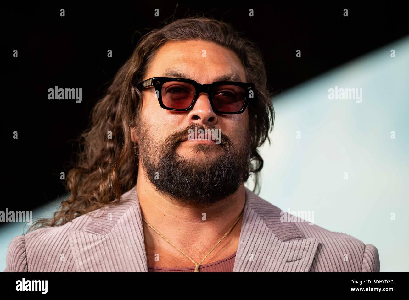 Jason Momoa poses for photographers upon arrival at the screening for ...