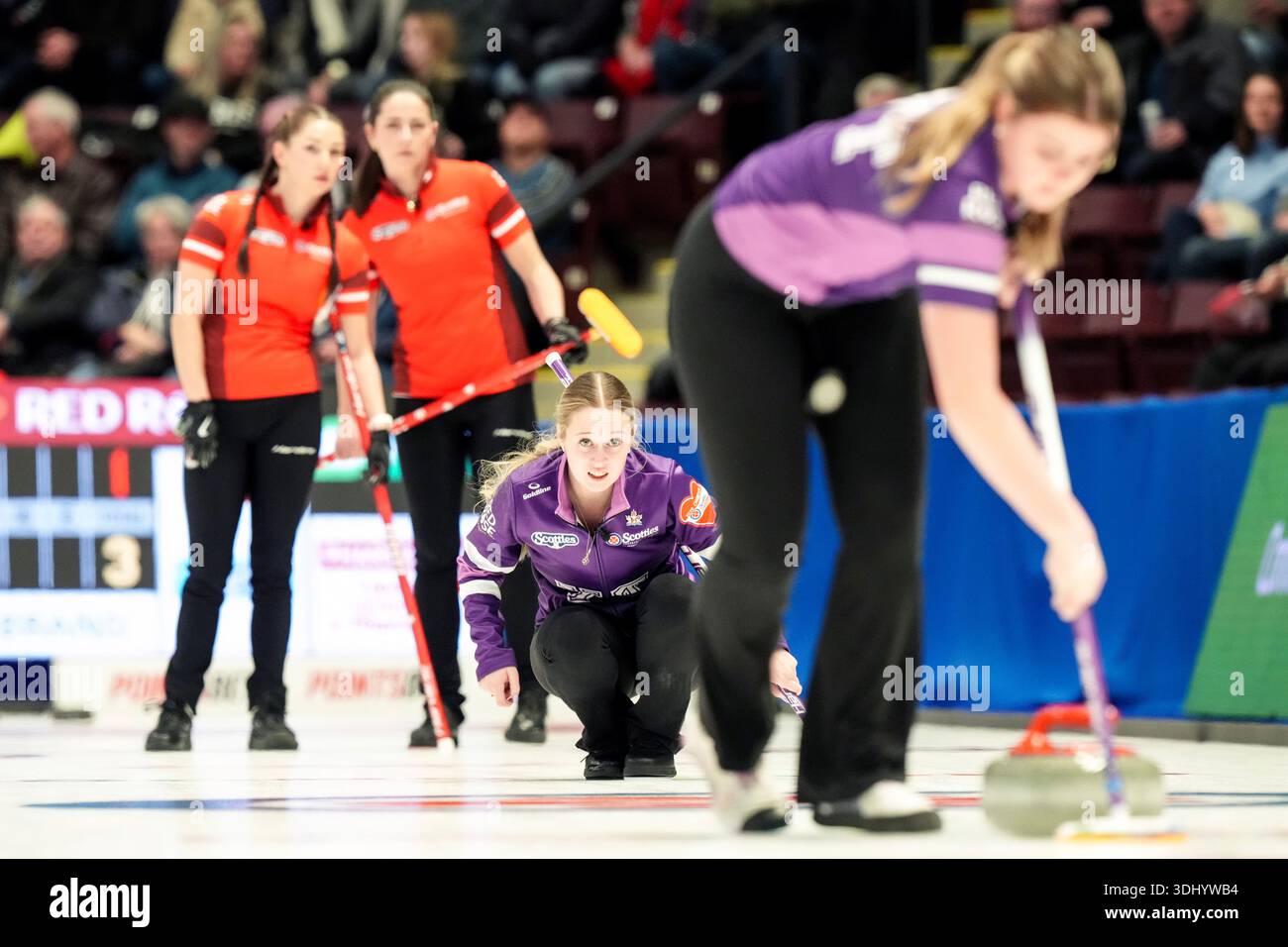 Yukon skip Bayly Scoffin watches as her stone is brushed down the ice ...