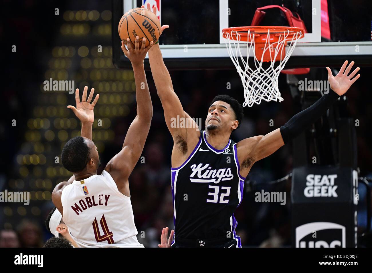 Sacramento Kings center Dylan Cardwell defended against Cleveland ...
