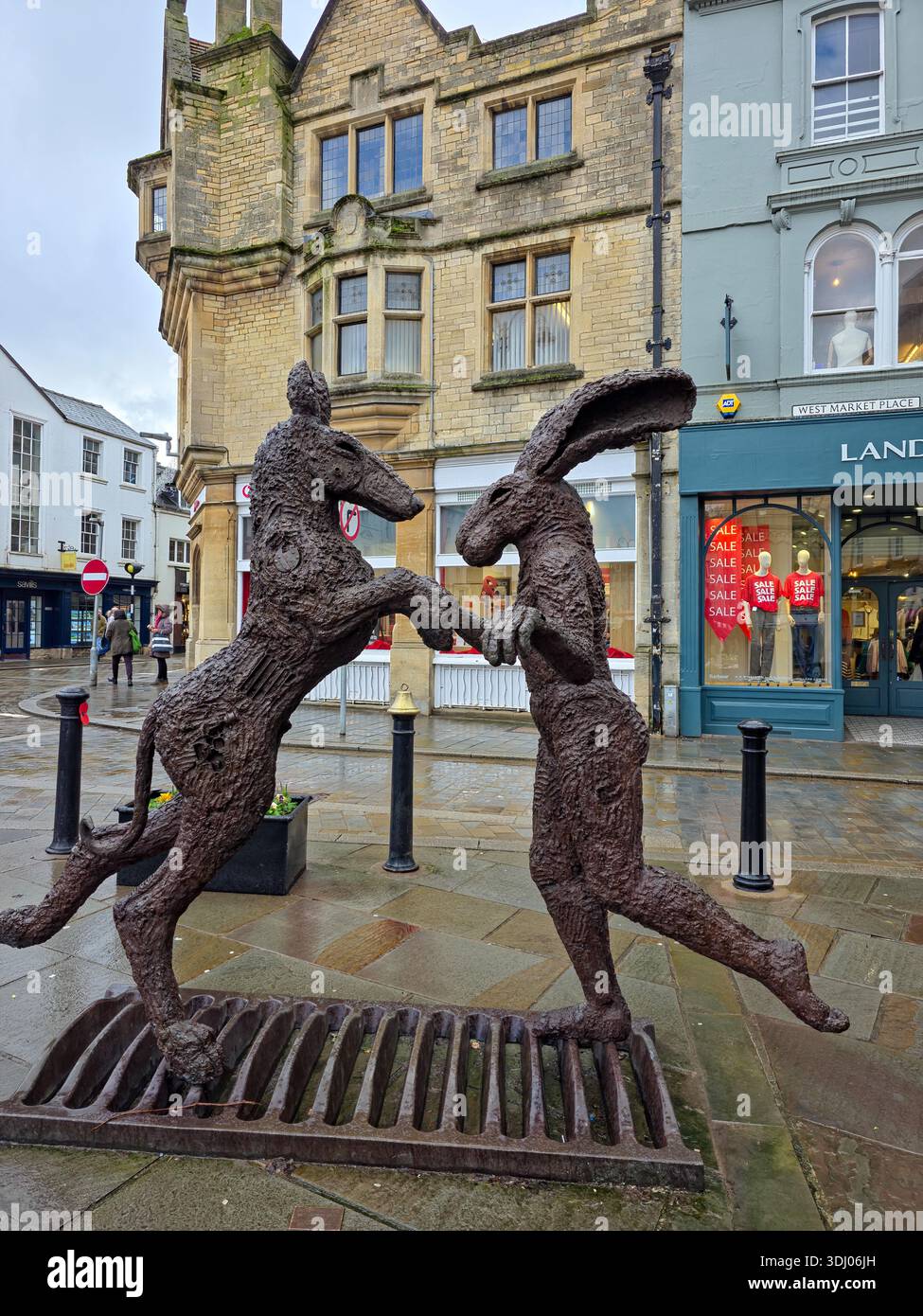Iconic boxing hares sculpture in historic Cirencester marketplace ...