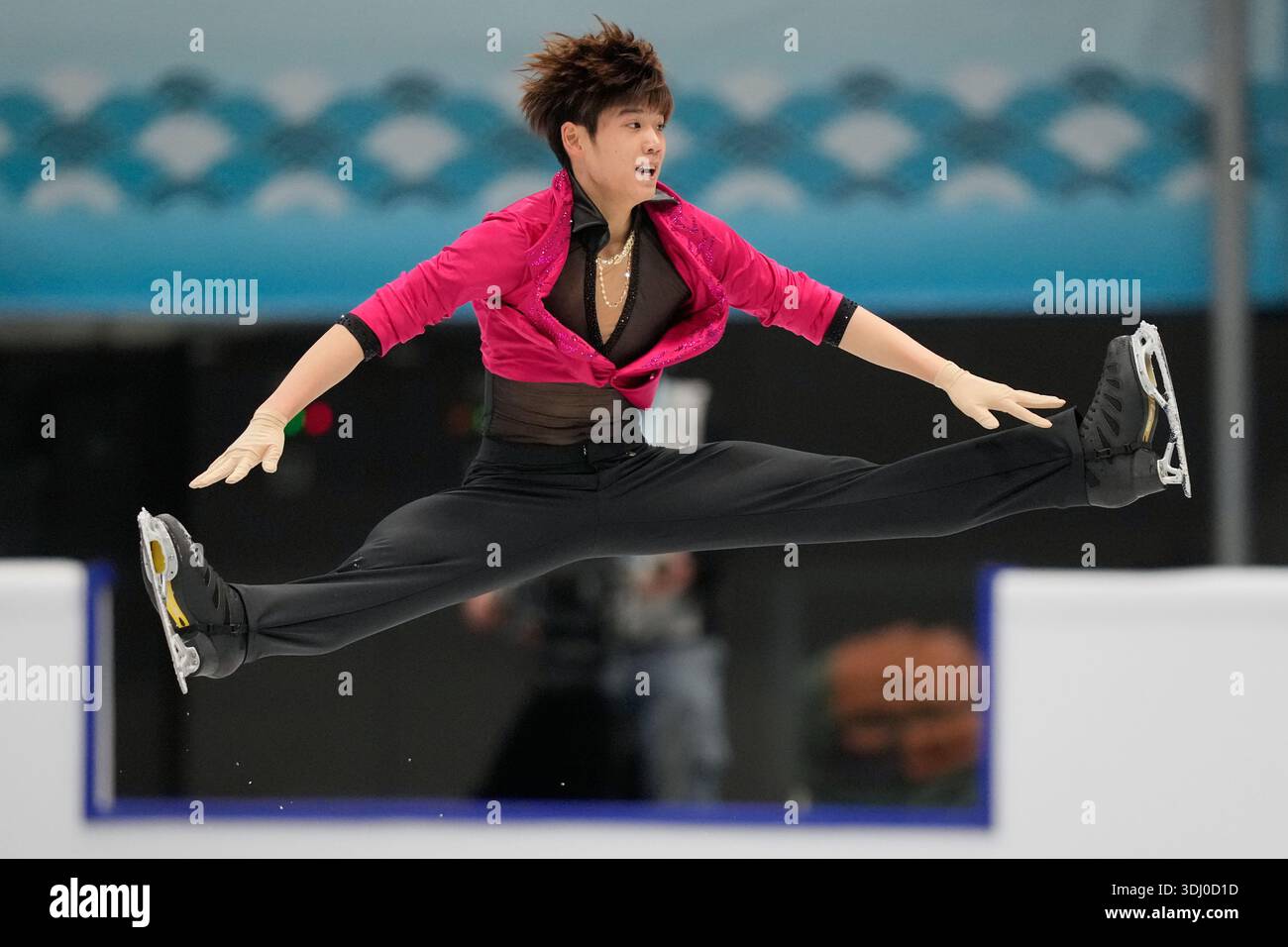 Fang Ze Zeng of Malaysia competes in the Men Short Program of the ISU ...