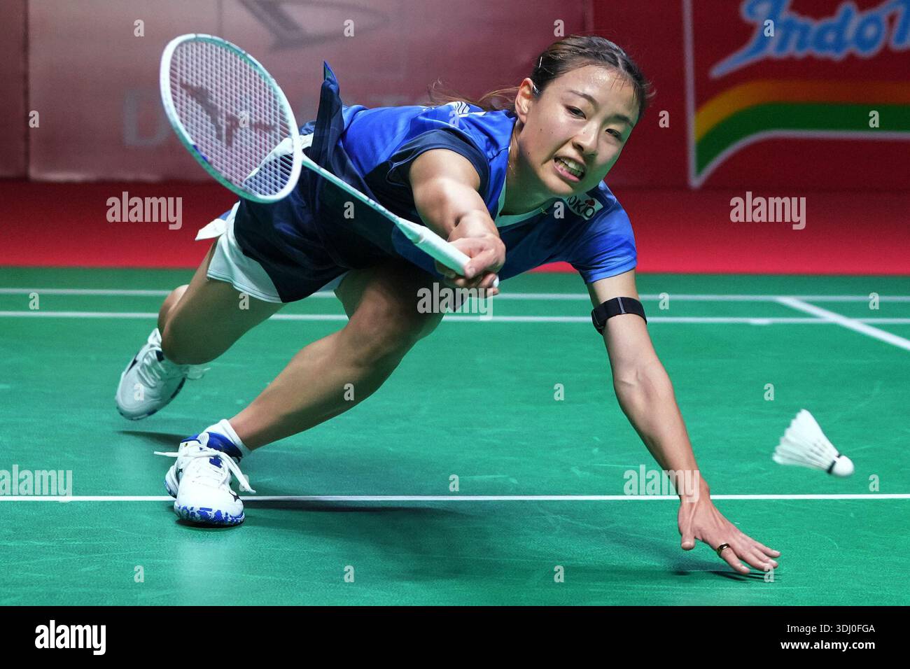 Japan's Nozomi Okuhara plays against China's Chen Yu Fei during their ...