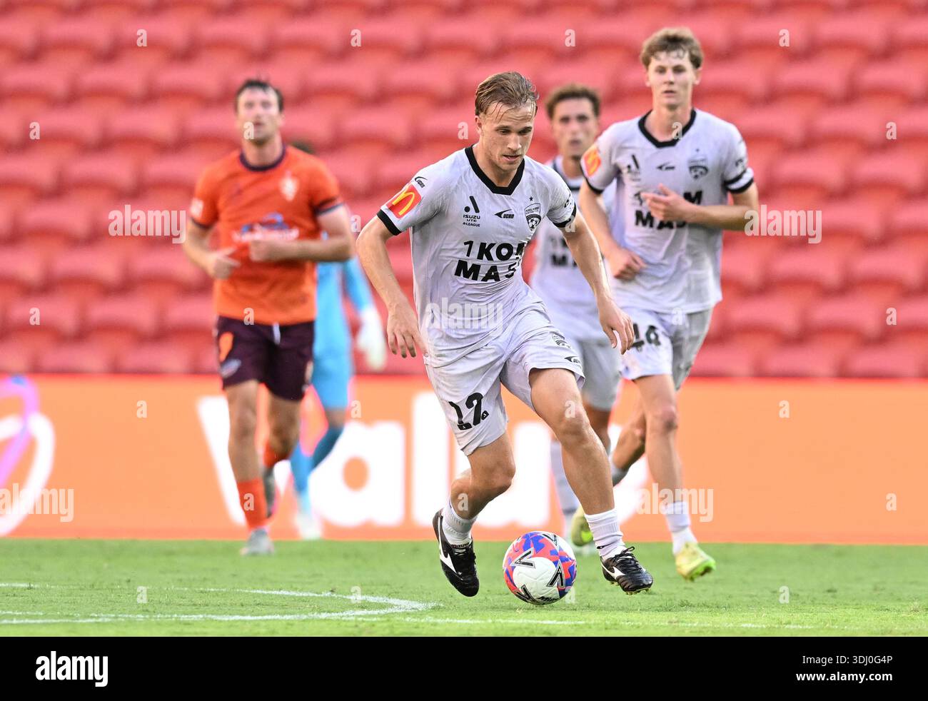 Brisbane, Australia. 24th Jan, 2026. Jonny Yull (centre) of Adelaide ...