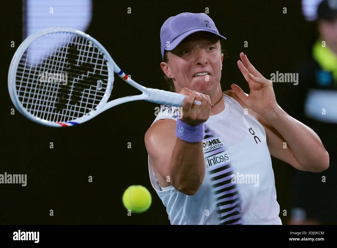 Iga Swiatek of Poland plays a forehand return to Anna Kalinskaya of ...