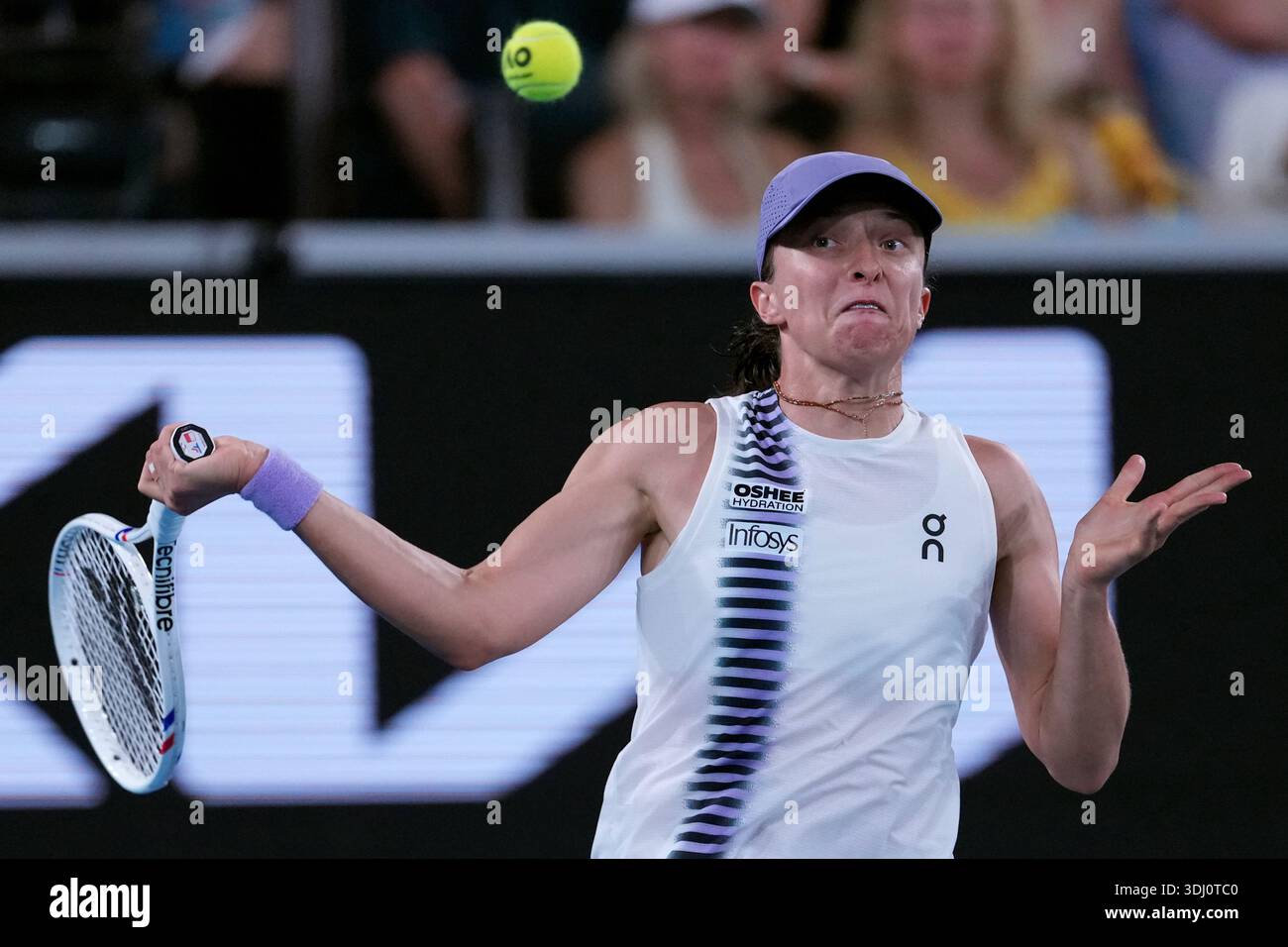 Iga Swiatek of Poland plays a forehand return to Anna Kalinskaya of ...