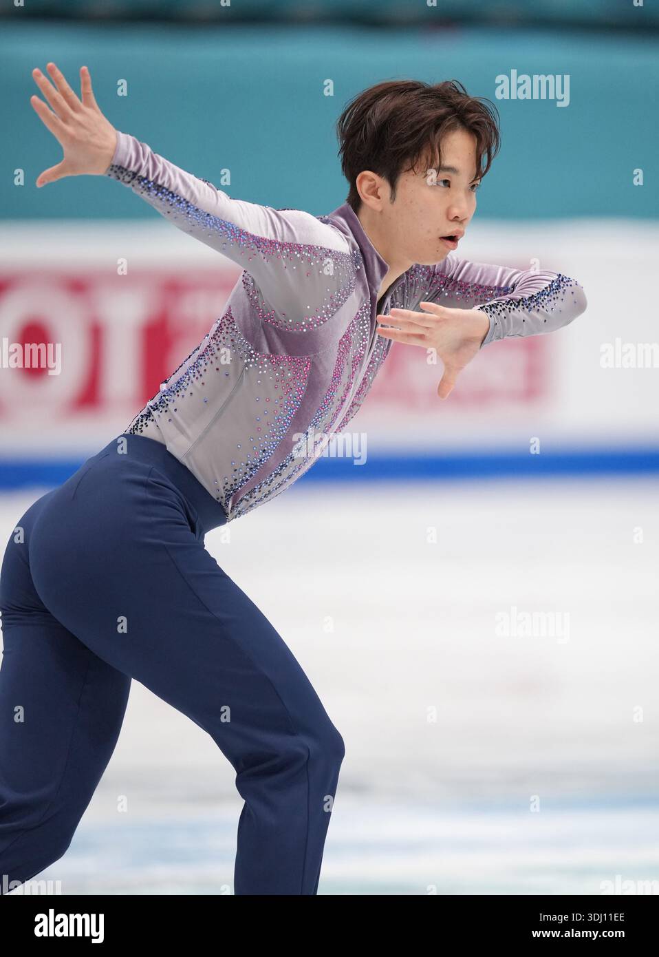 Kazuki TOMONO of Japan performs in the men's short program of the ISU ...