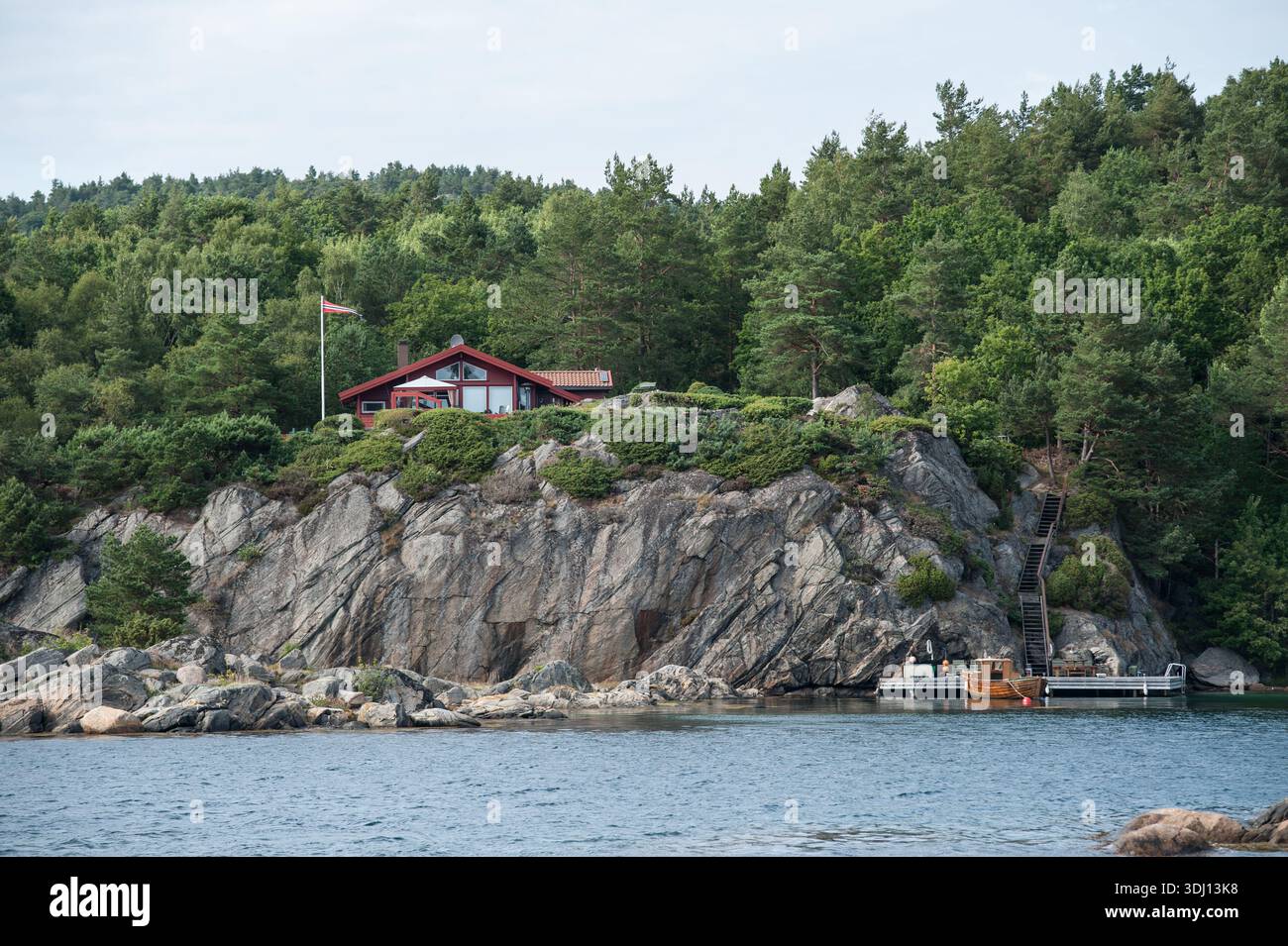 scenic cliffside cabin with private dock Stock Photo - Alamy
